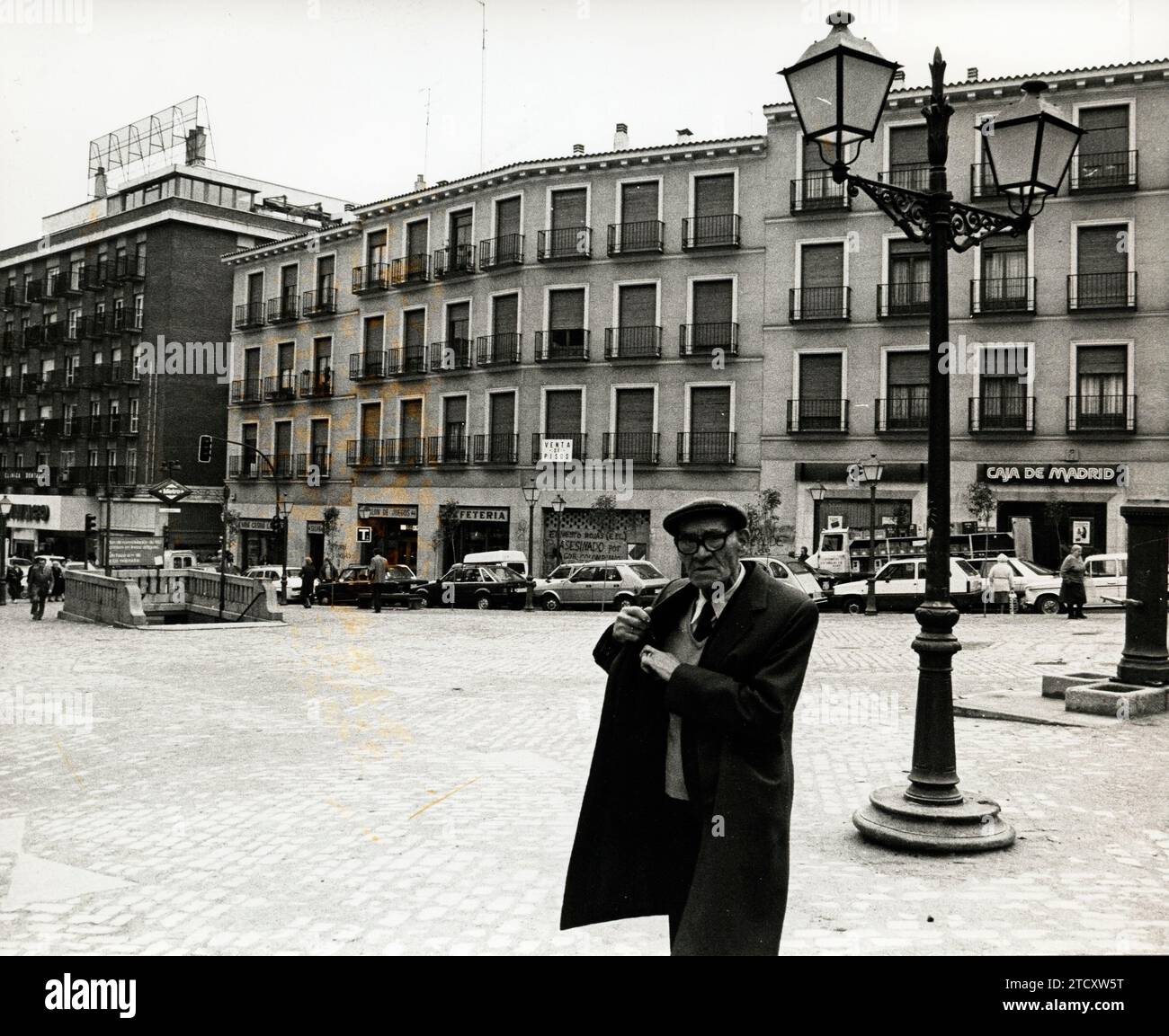 Madrid. 1987. A man walks through the Plaza de Lavapiés. In the ...