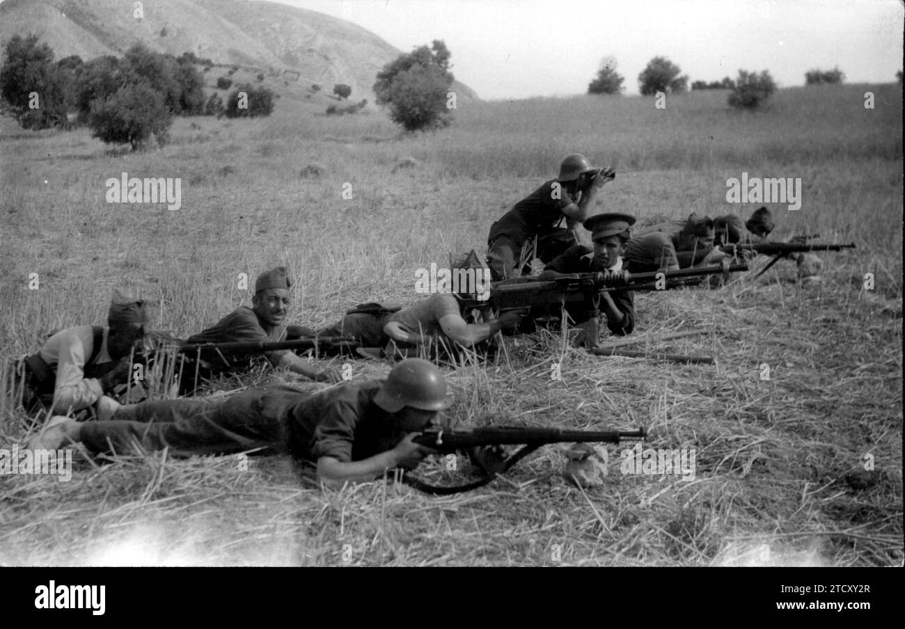 09/30/1936. Soldiers Handling a Machine Gun and Rifles, Defending ...
