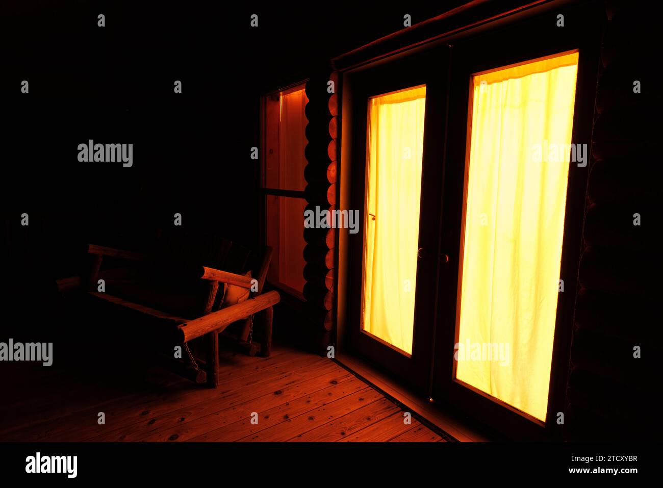 windows illuminated at night on the porch Stock Photo - Alamy