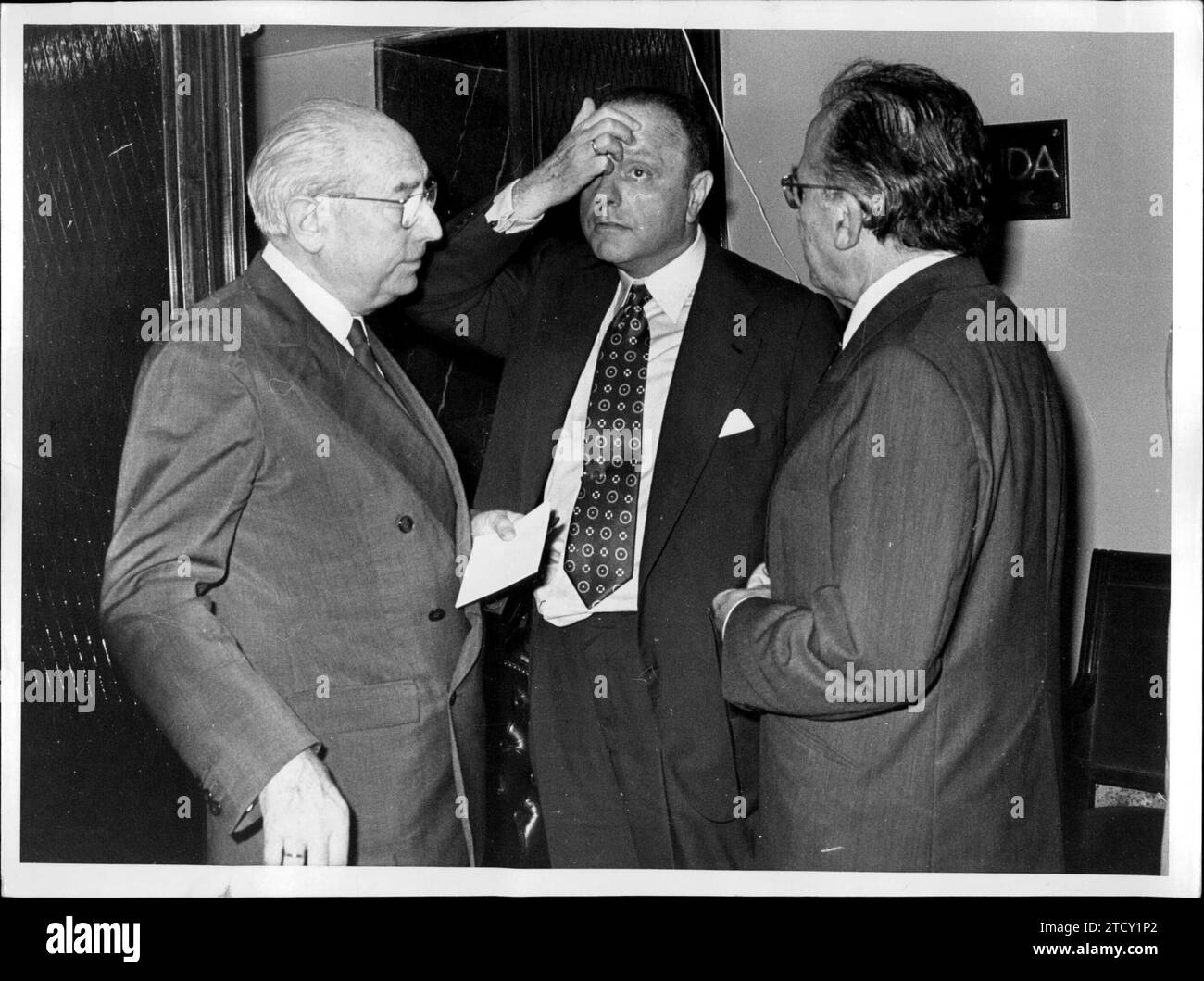 07/13/1977. Don Manuel Fraga, Santiago Carrillo and tender Galván in ...
