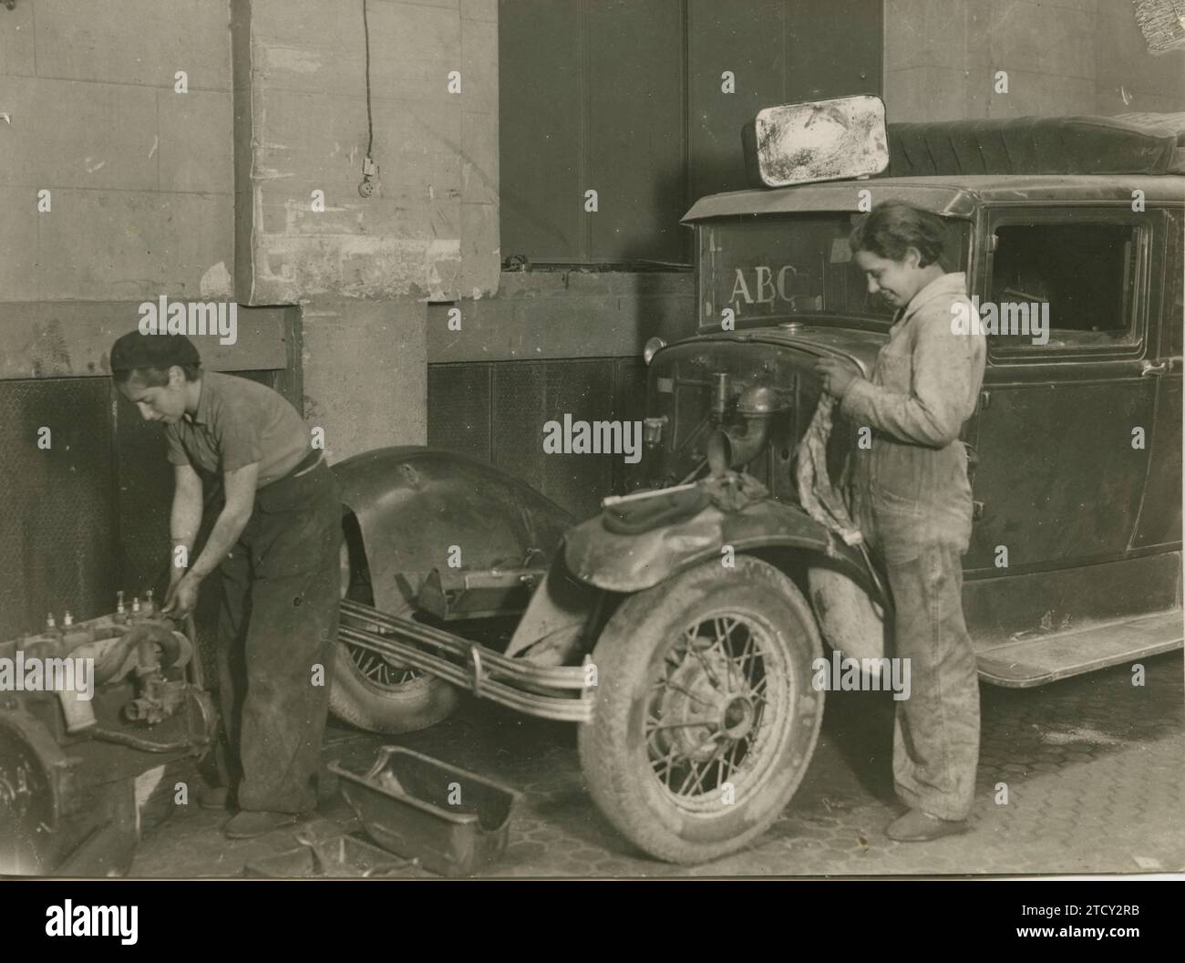 Madrid, May 1938. Girls working in the Prensa Española automobile ...