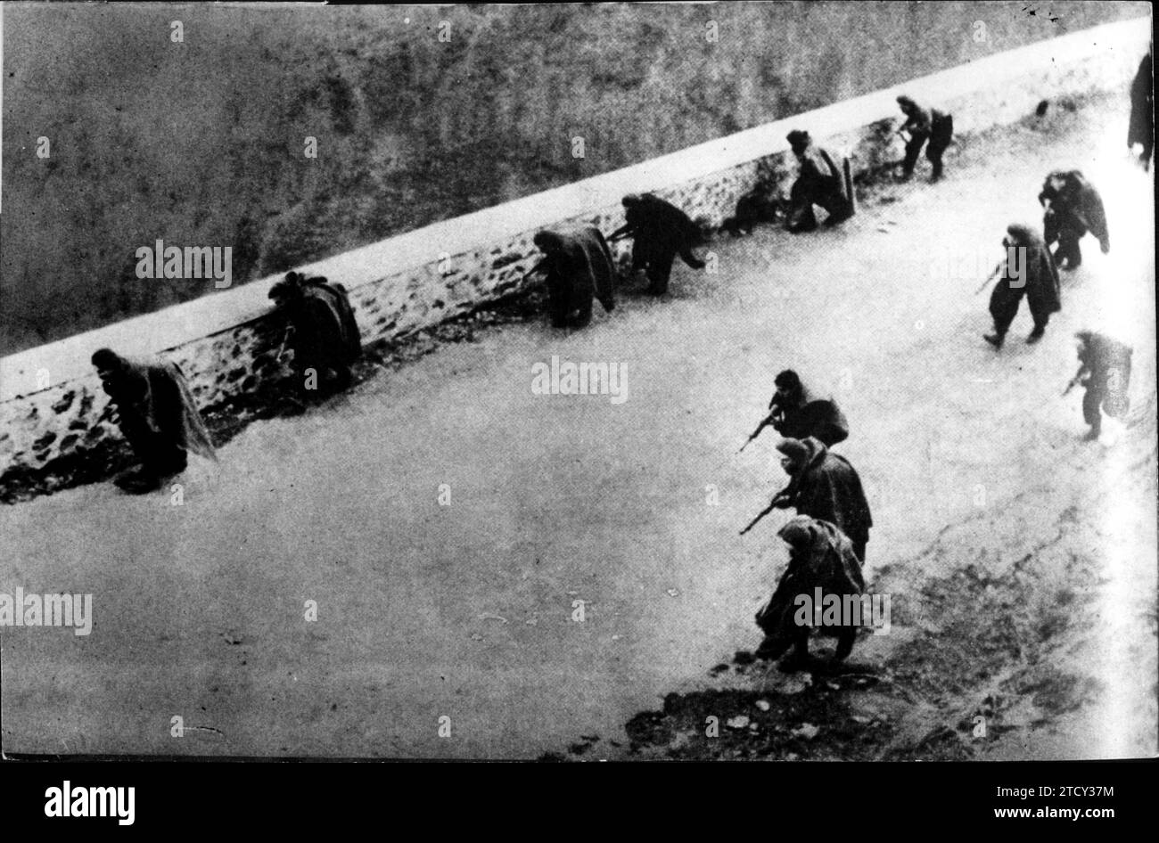 09/30/1937. National Troops Advancing along a road on the northern ...