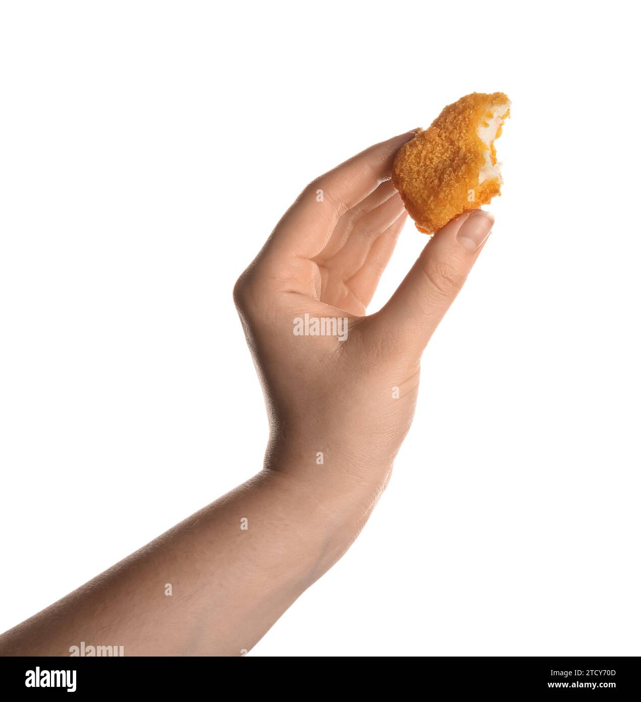 Female hand with tasty nugget on white background Stock Photo - Alamy