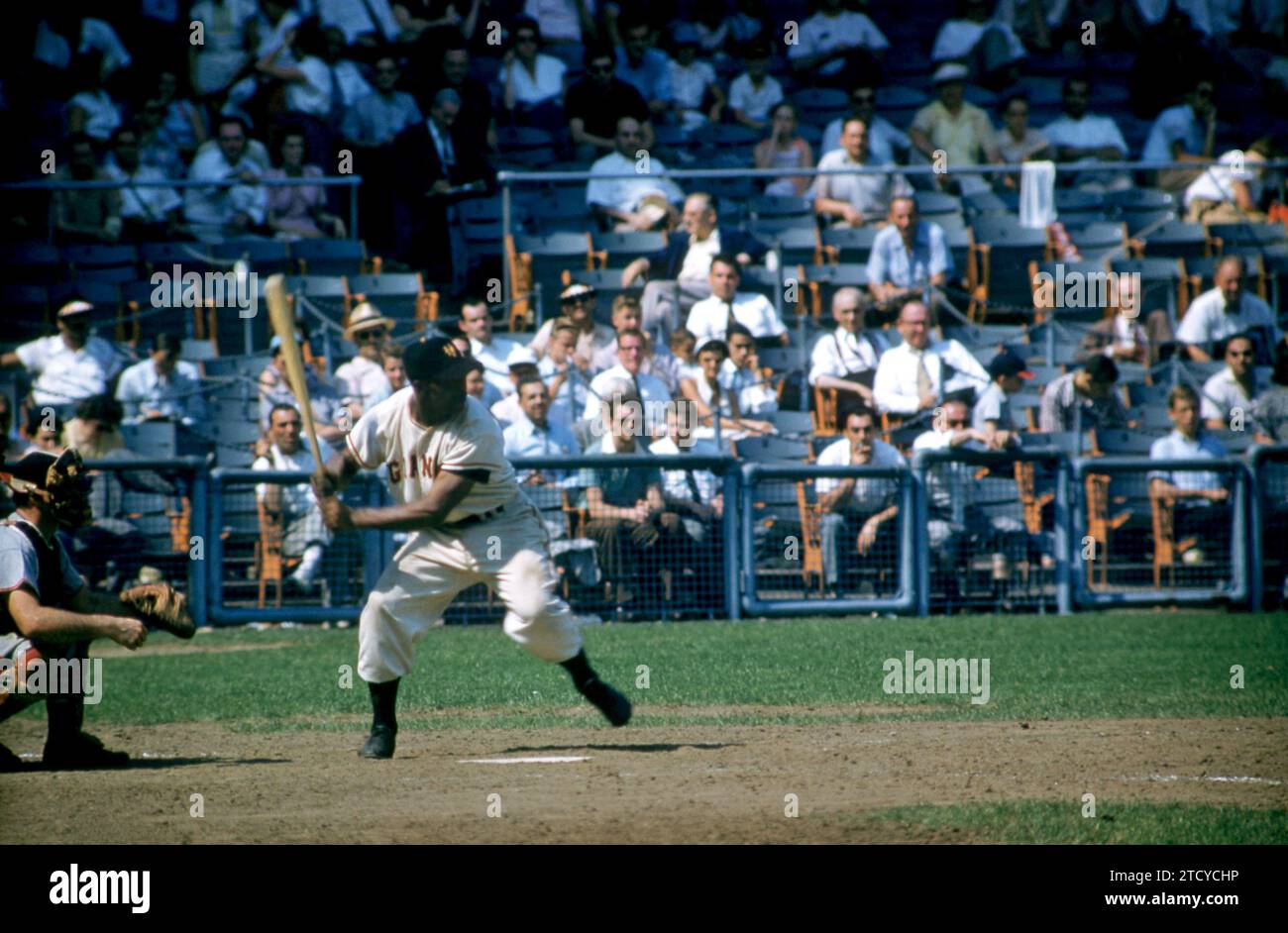 NEW YORK, NY - 1955: Willie Mays #24 of the New York Giants bats during ...