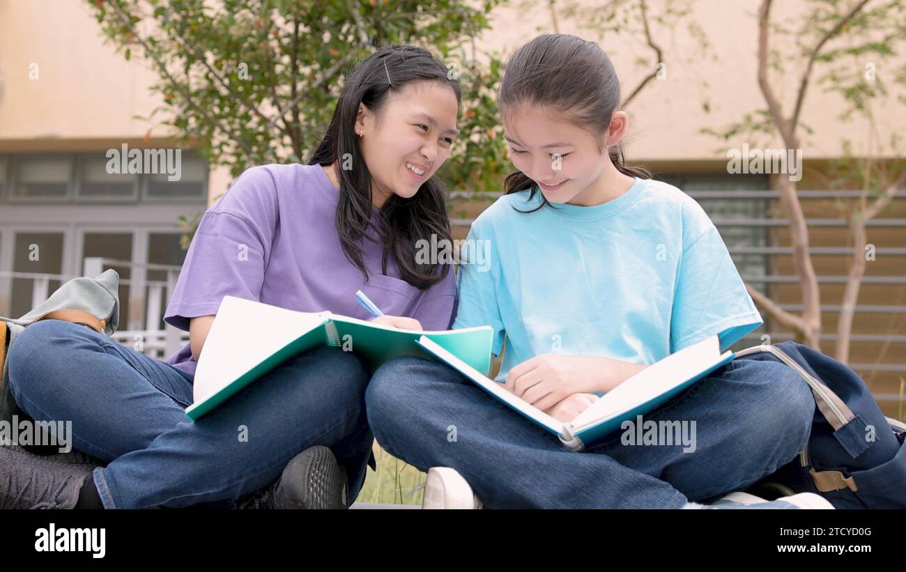 Happy teenage girls talking class hi-res stock photography and images ...