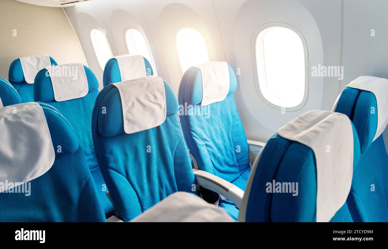 Economy class cabin seats seating hi-res stock photography and images ...