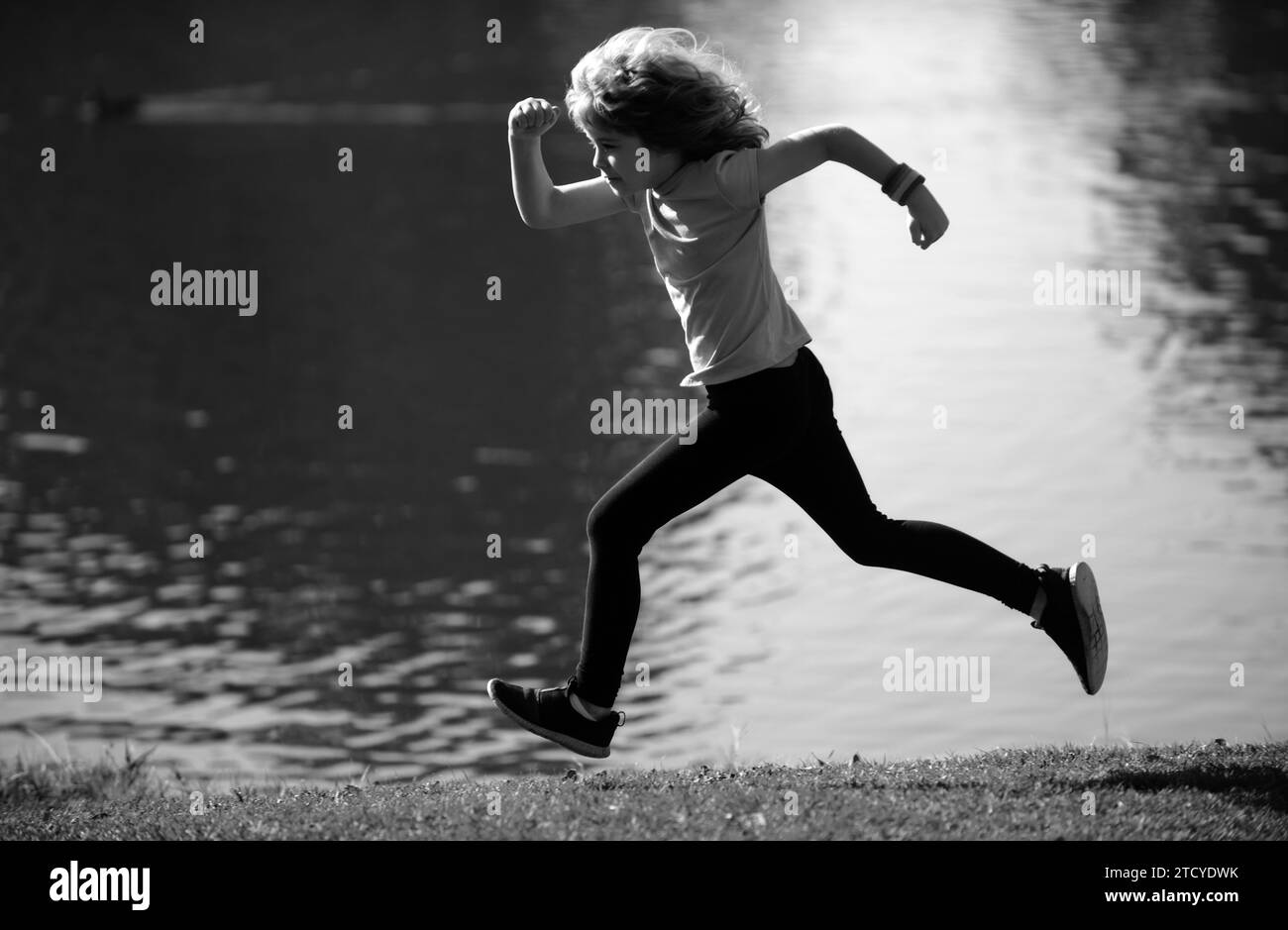 Children running in the park Black and White Stock Photos & Images - Alamy