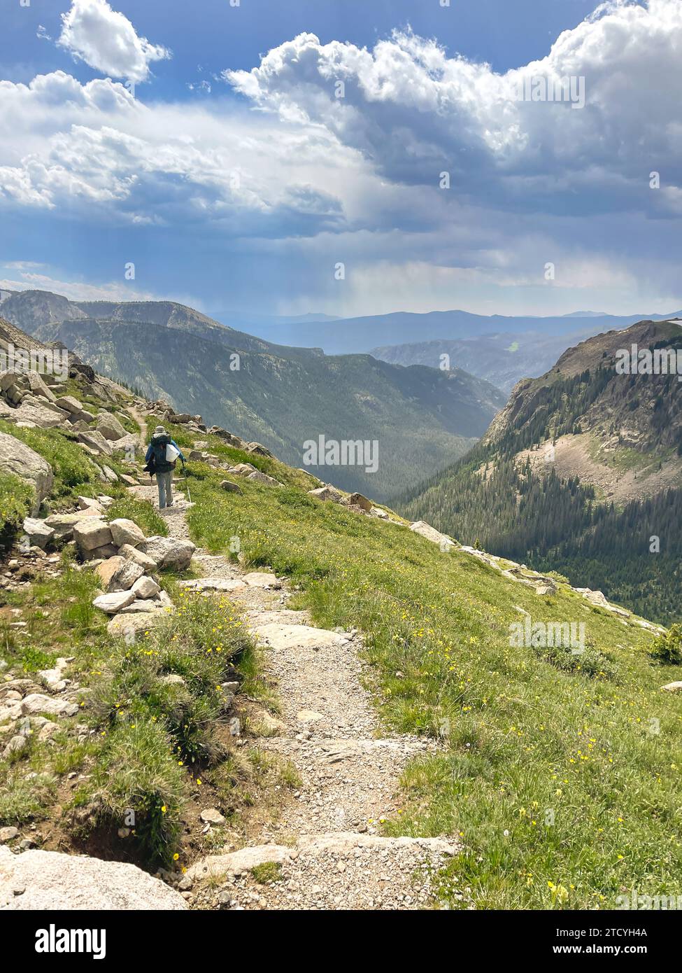 A lone hiker enjoys the vast expanses of the North Inlet Trail, with ...