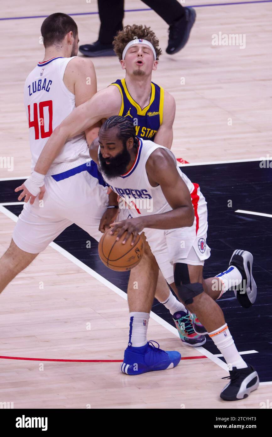 Los Angeles, California, USA. 14th Dec, 2023. Los Angeles Clippers' James Harden #1 drives ...