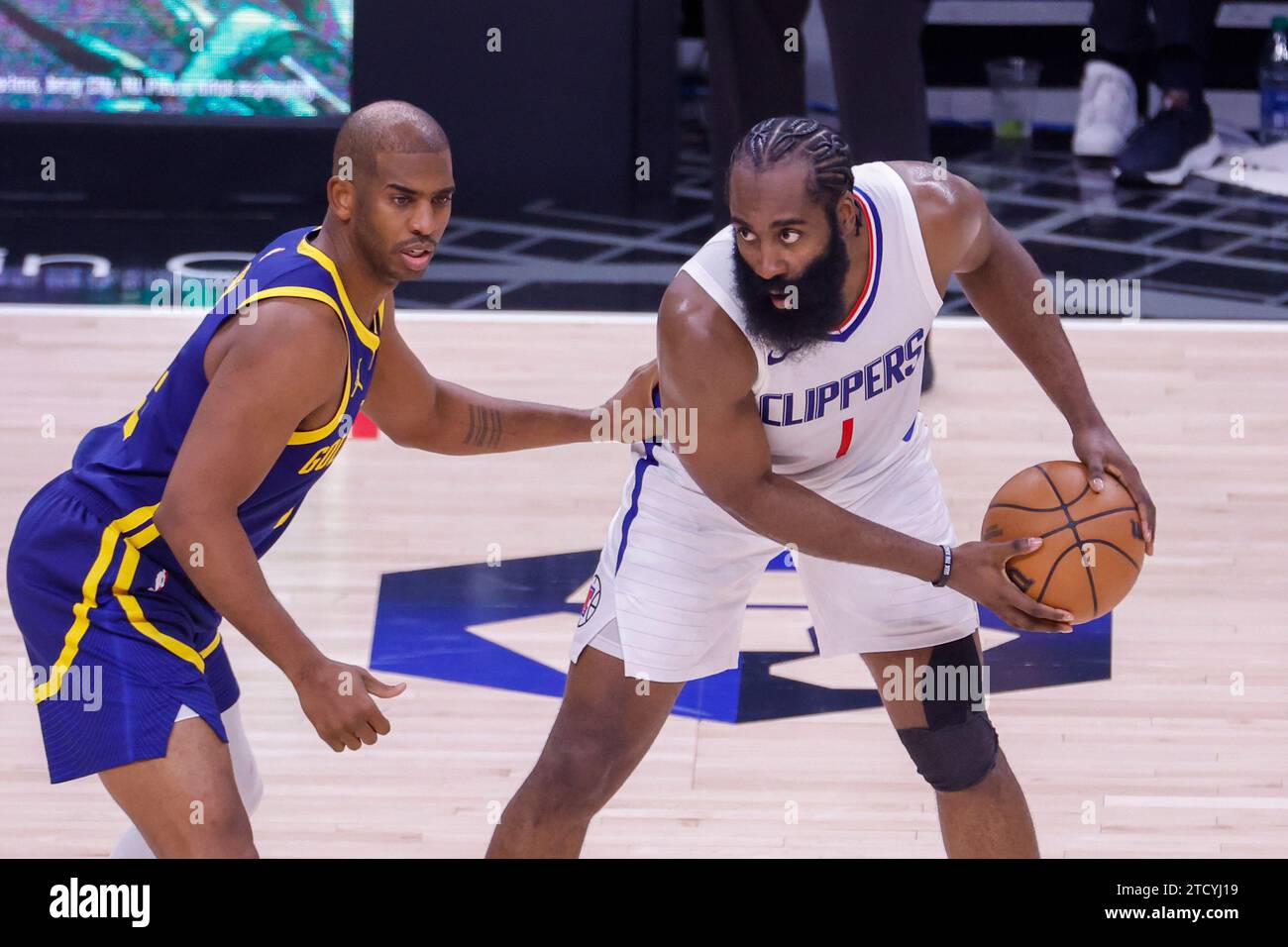 Los Angeles, California, USA. 14th Dec, 2023. Los Angeles Clippers' James Harden #1 is defended ...