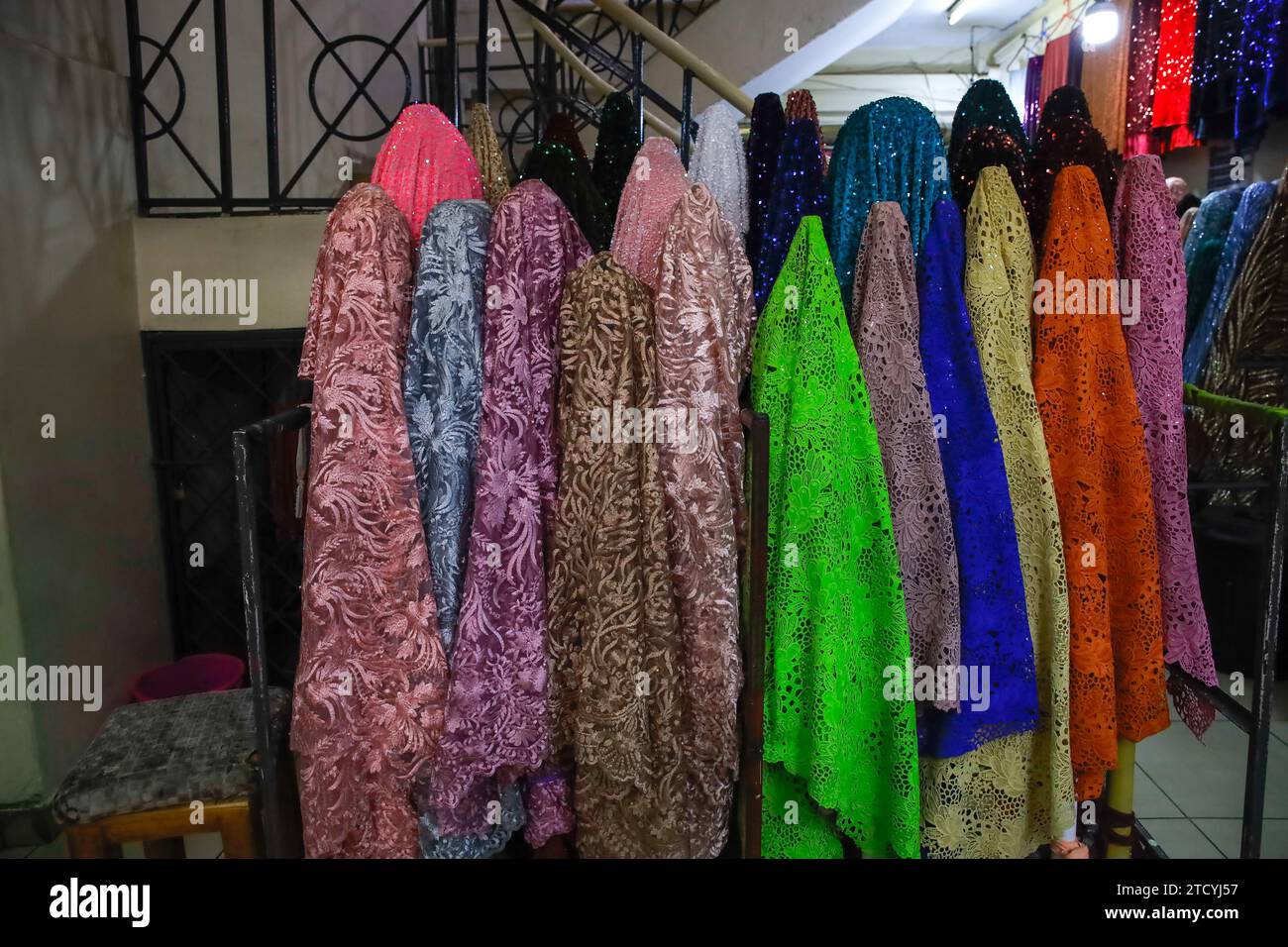 Traders selling fabric products at a textile shop in Biashara Street on ...