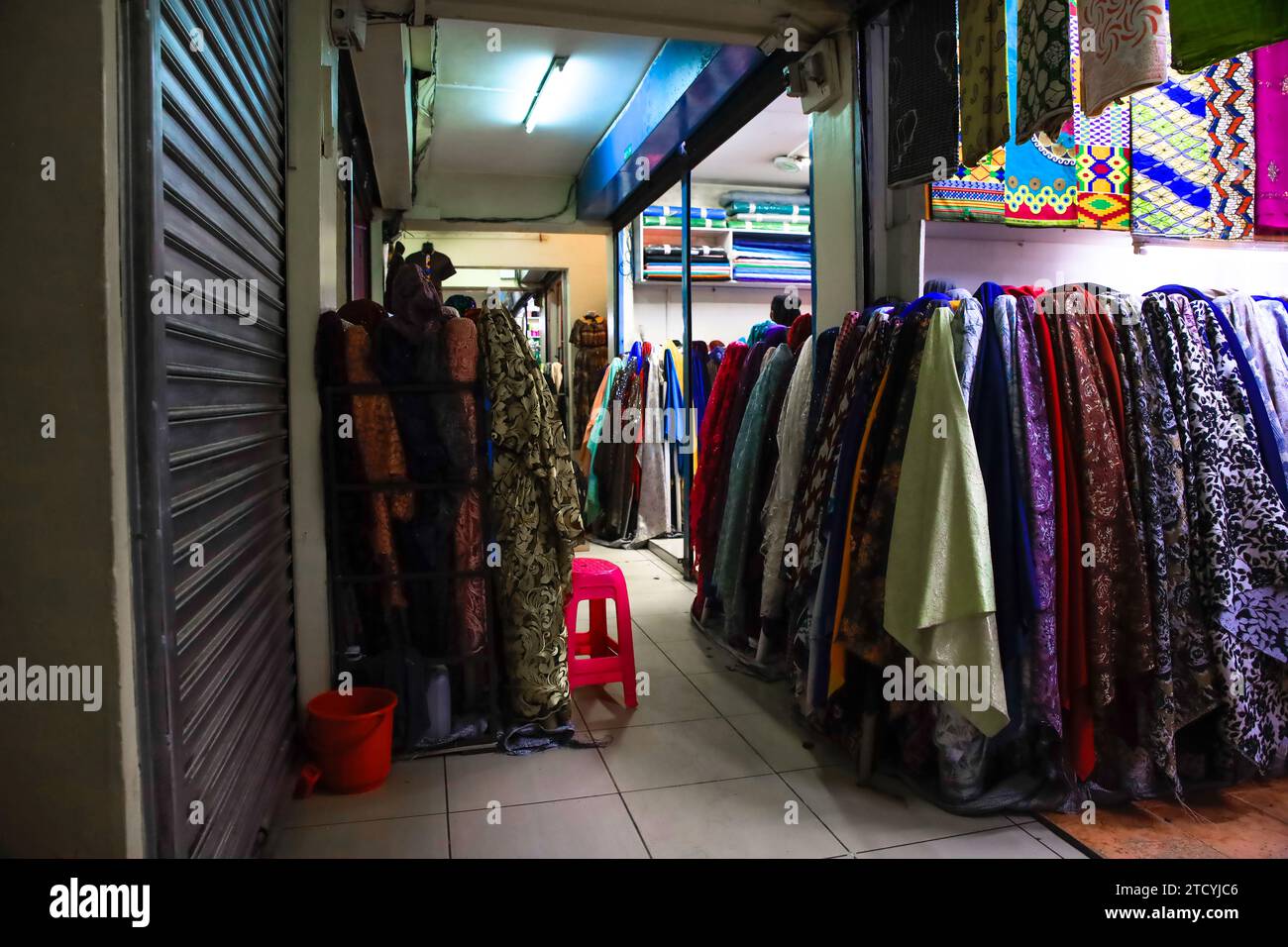 Traders selling fabric products at a textile shop in Biashara Street on ...