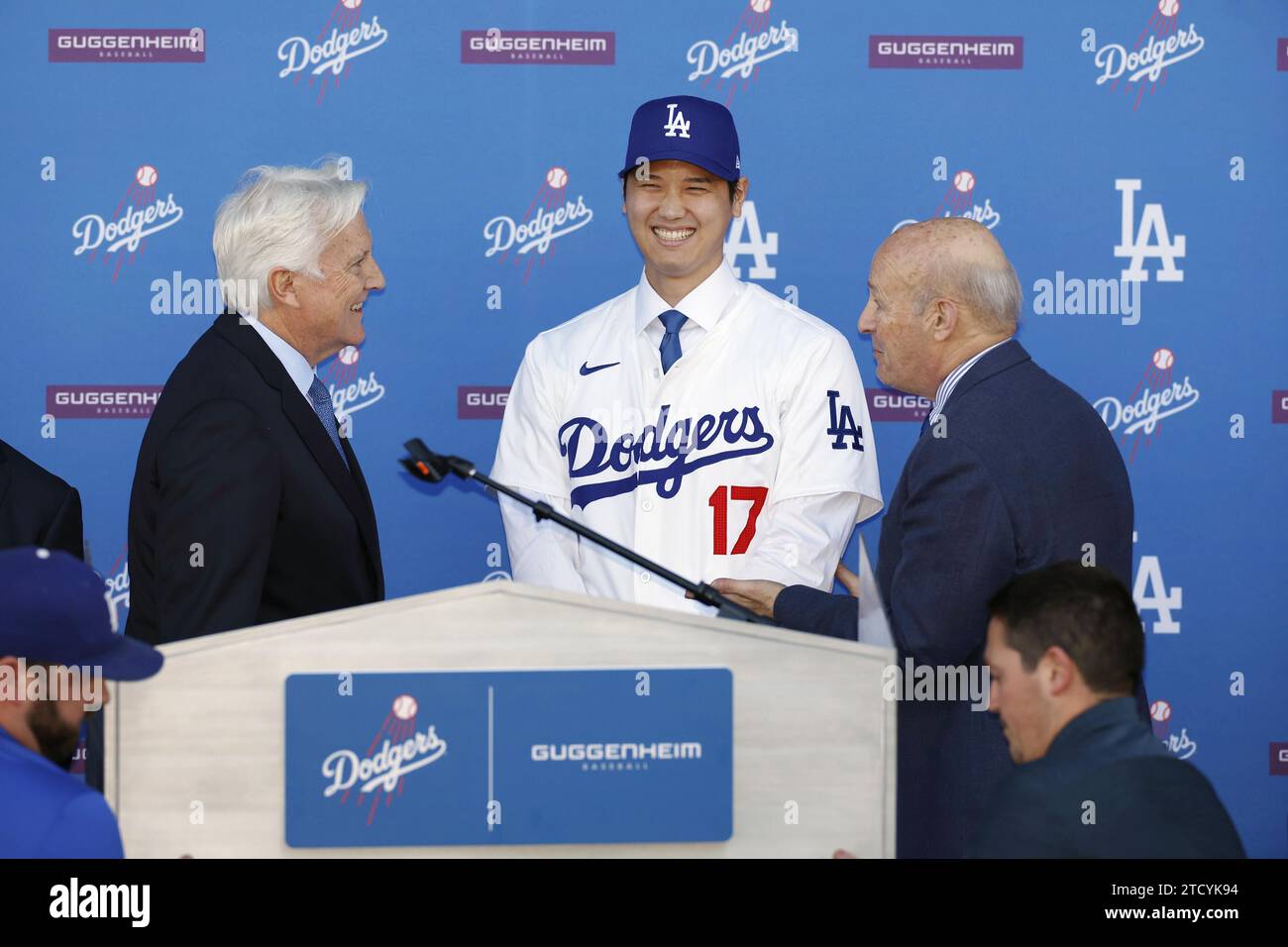 New Los Angeles Dodger Shohei Ohtani (C) is introduced at a press ...