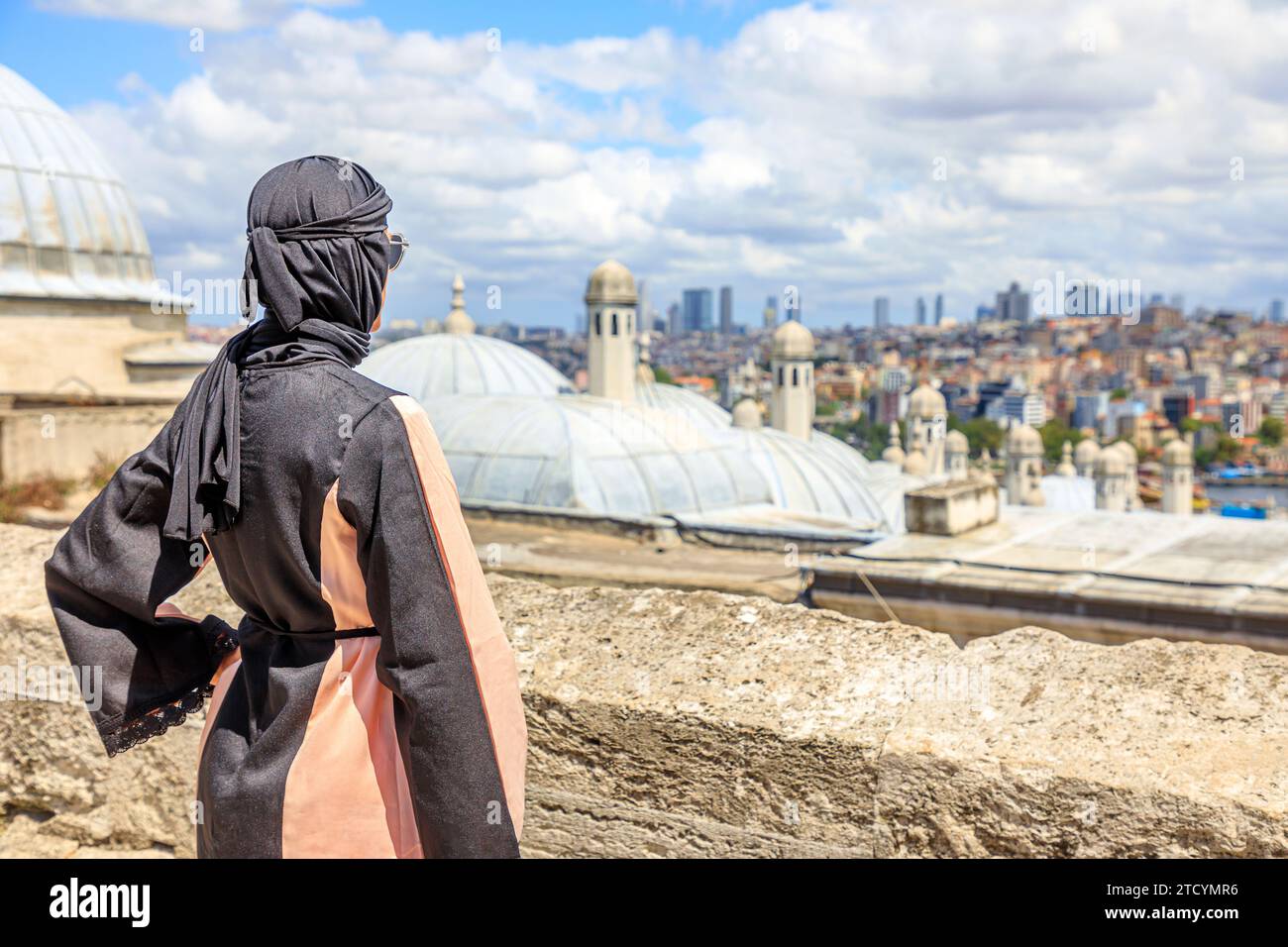 From Suleymaniye Mosque, Islamic woman in traditional Arab hijab dress ...