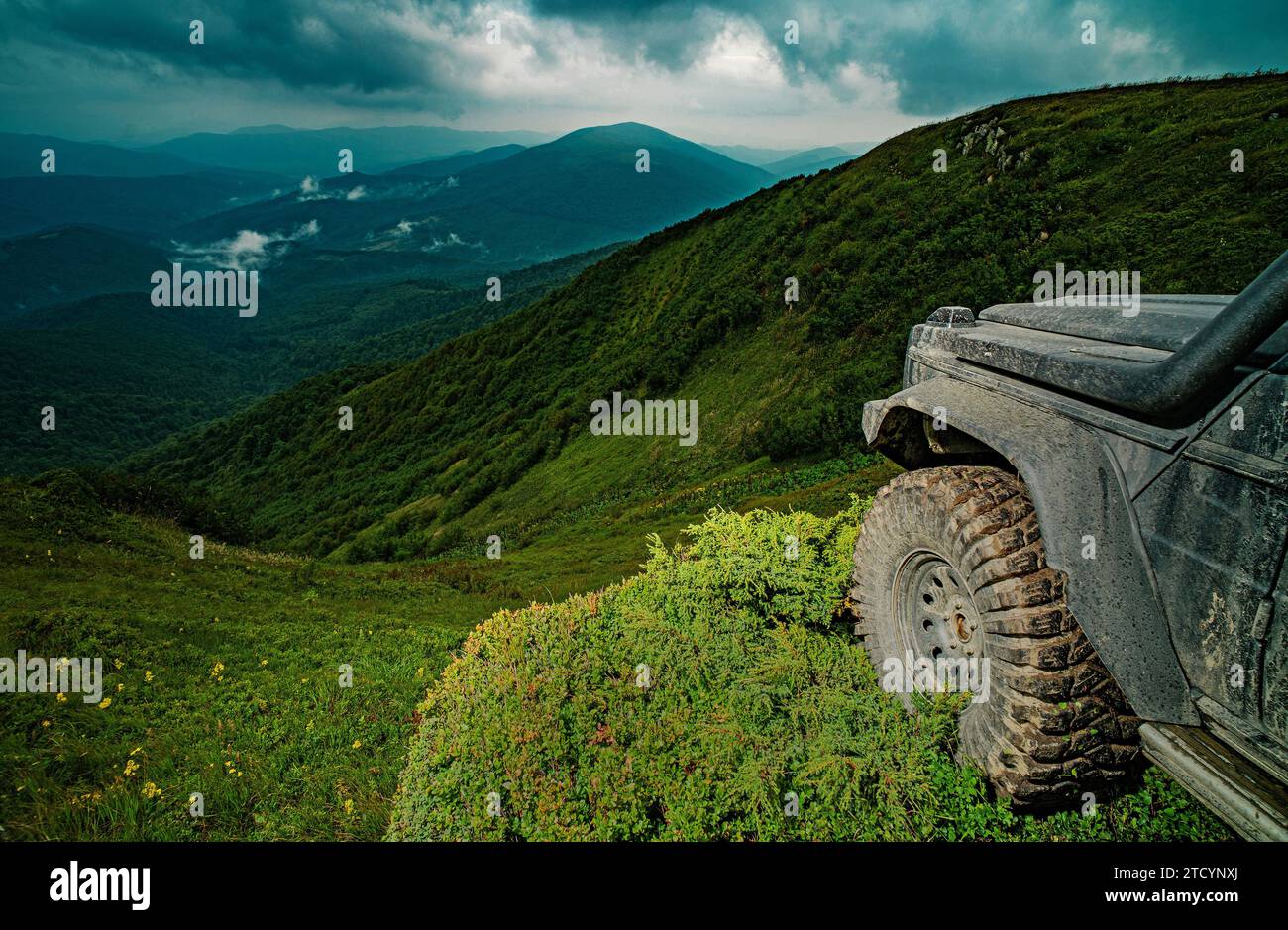 Off-road Jeep car on bad gravel road. Off-road travel on mountain ...