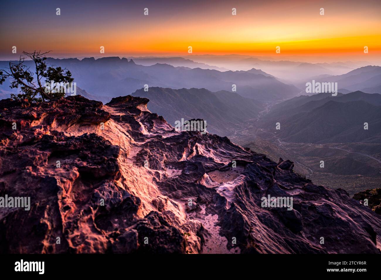 Colorful landscape background at sunrise in the Asir Mountains in Saudi ...