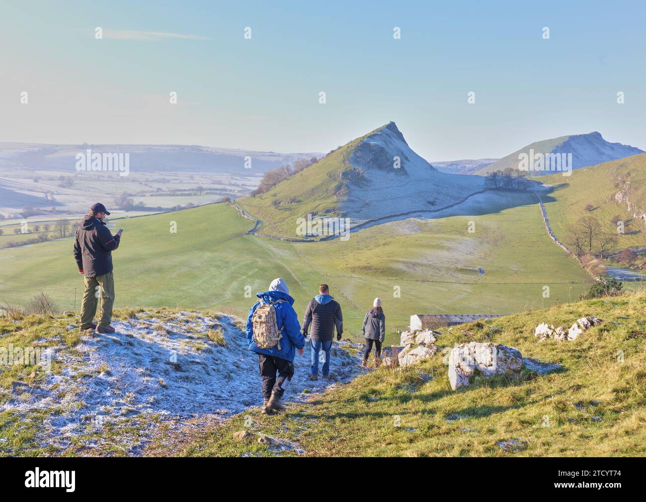 Group of four ramblers descend Hitter hill, opposite Parkhouse hill and ...