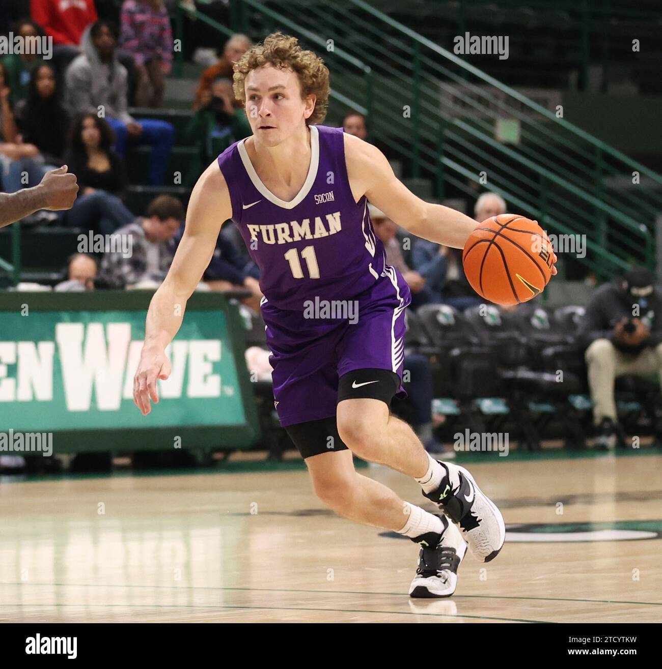 Furman Paladins guard Carter Whitt (11) drives to the basket during a ...