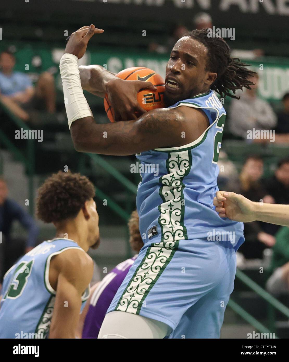 Tulane Green Wave forward Kevin Cross (24) pulls down a rebound during ...