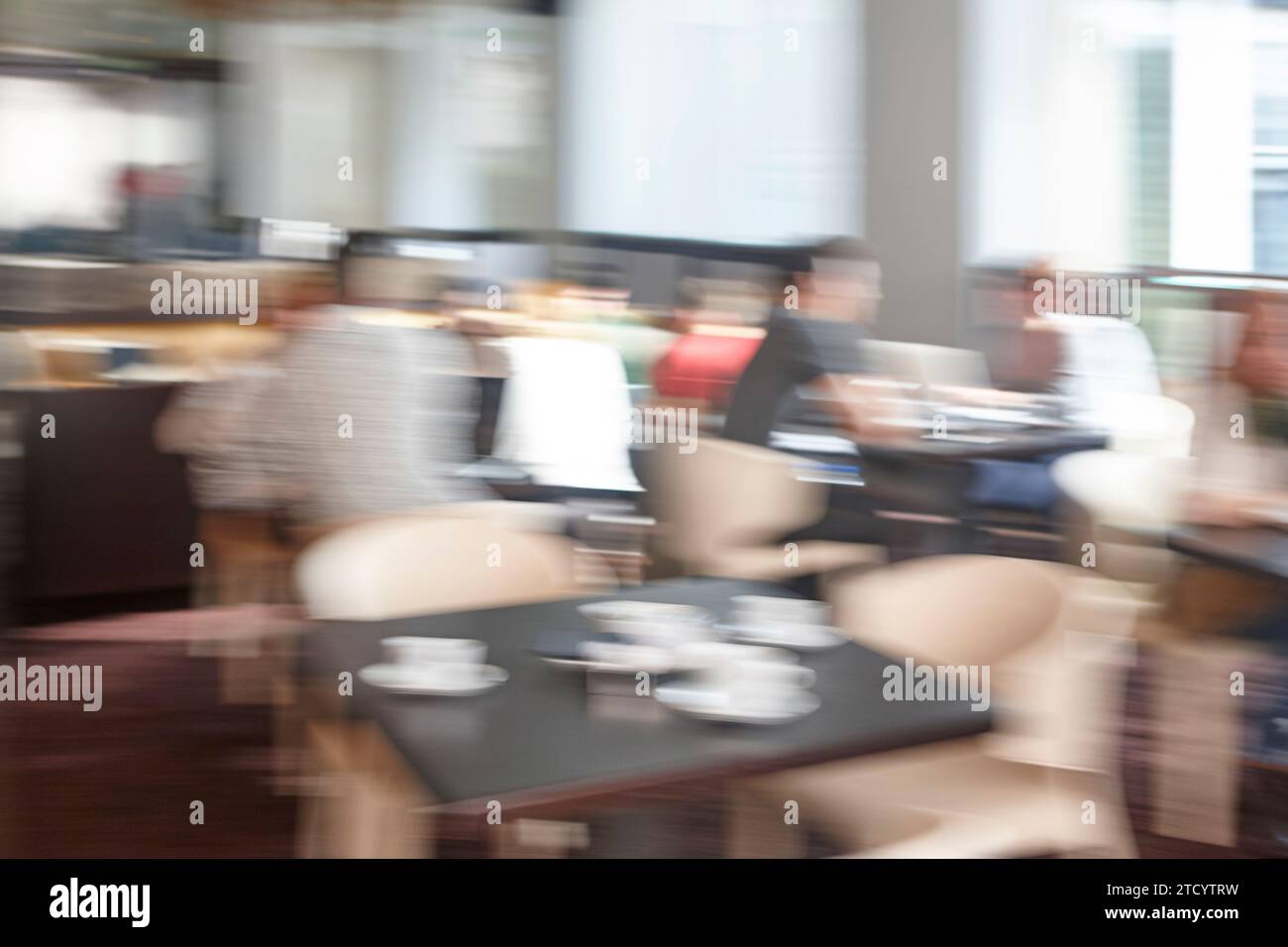 Motion effect in photography. Slow time exposure. Indoor restaurant ...