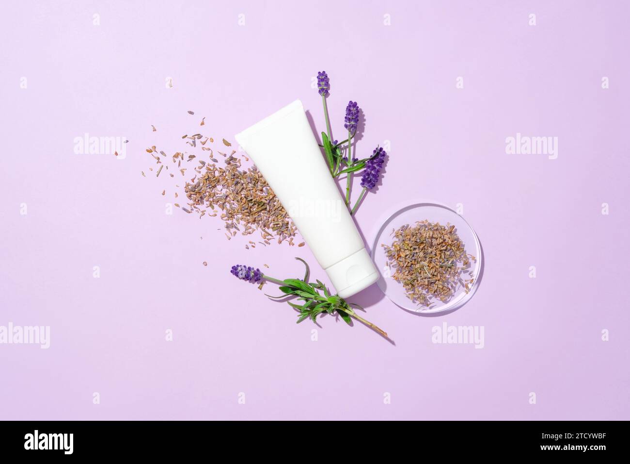 A tube of unbranded cosmetics is displayed with fresh and dried ...