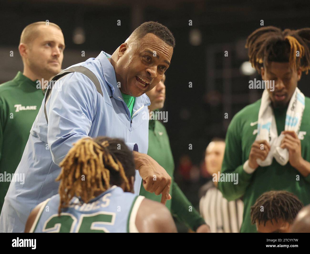 Tulane Green Wave head coach Ron Hunter talks to his team during a timeout of a men’s basketball ...