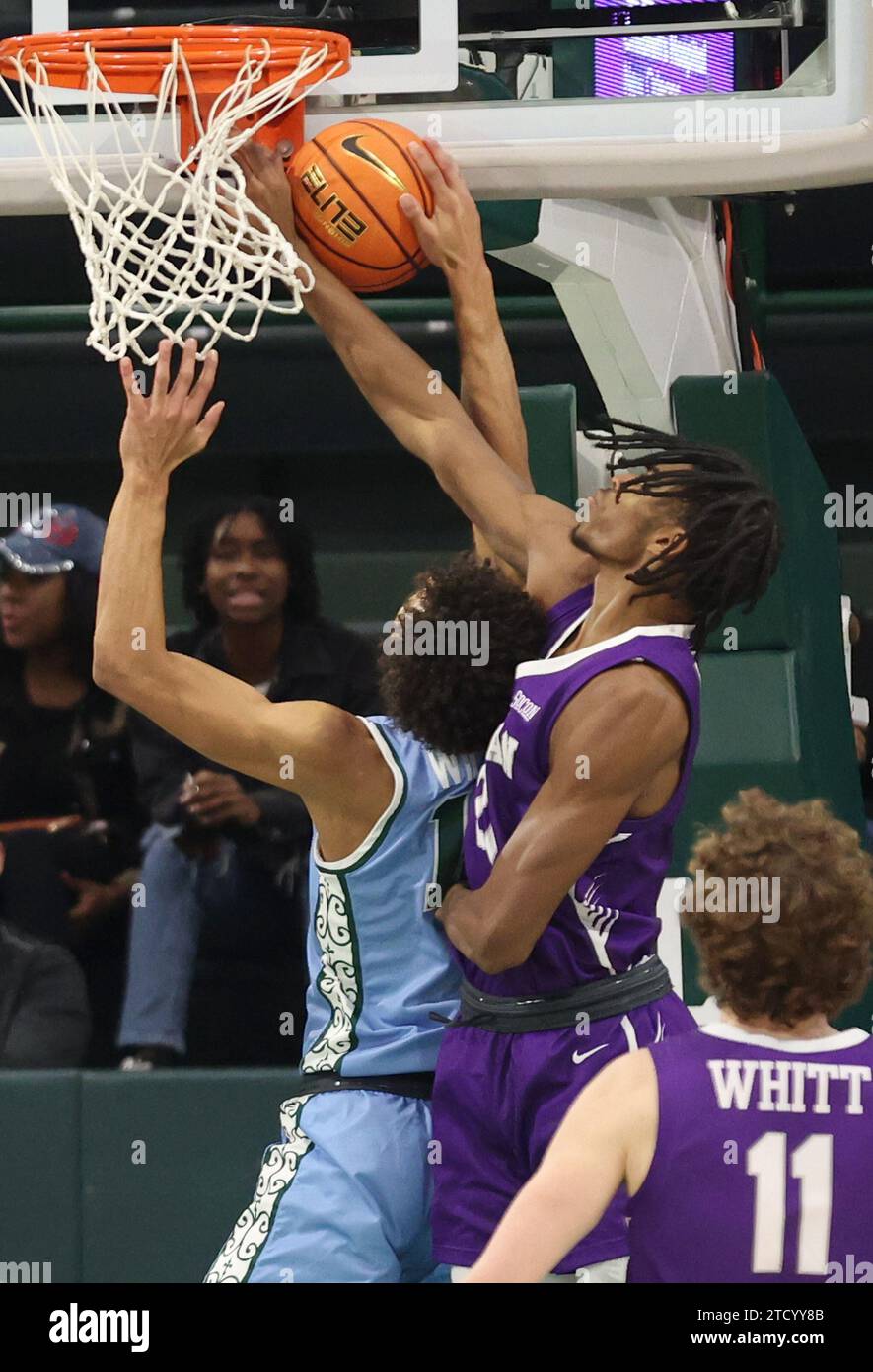 Furman Paladins forward Cooper Bowser (21) blocks Tulane Green Wave ...
