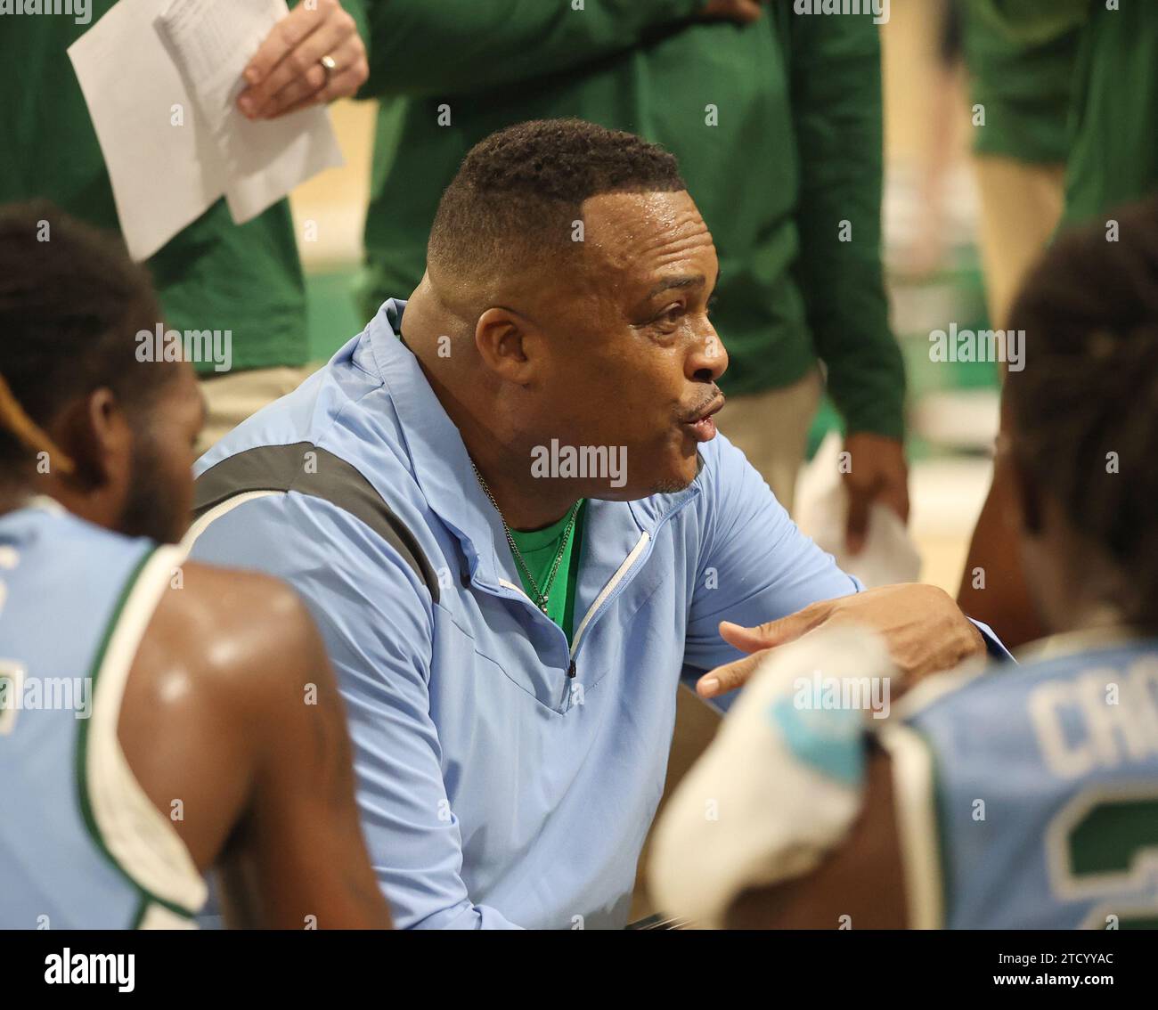 Tulane Green Wave head coach Ron Hunter talks to his team during a ...
