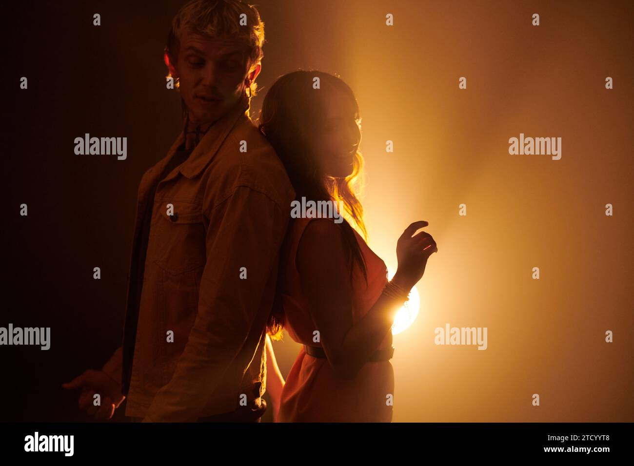 Boyfriend and girlfriend dancing to music at rave party Stock Photo - Alamy