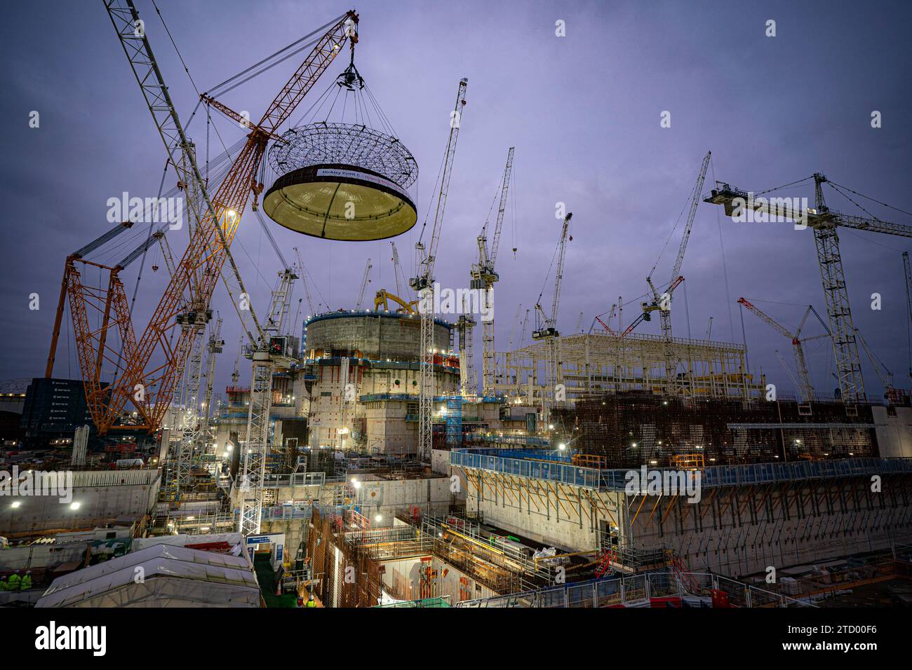 Engineering teams use the world's largest crane - Big Carl - to lift a 245-tonne steel dome onto ...