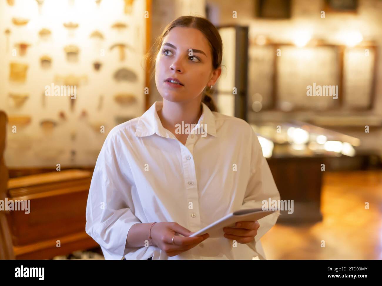 Woman visiting sculpture hall in historical museum Stock Photo - Alamy