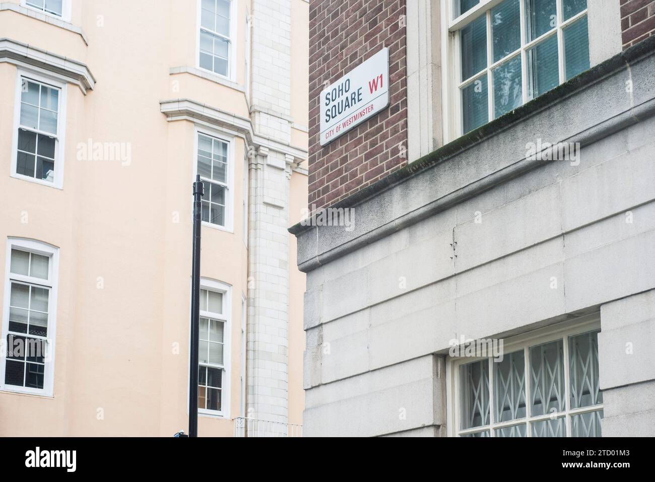 A signpost on the side of the building in Soho Square, London UK Stock ...