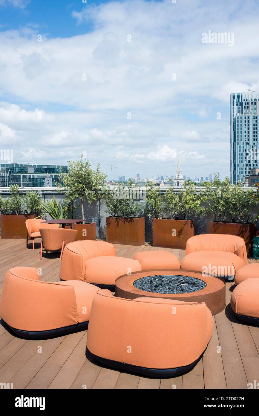 A break out lounge rooftop space of an office in central London with ...