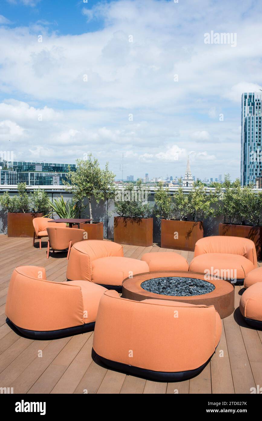 A break out lounge rooftop space of an office in central London with ...