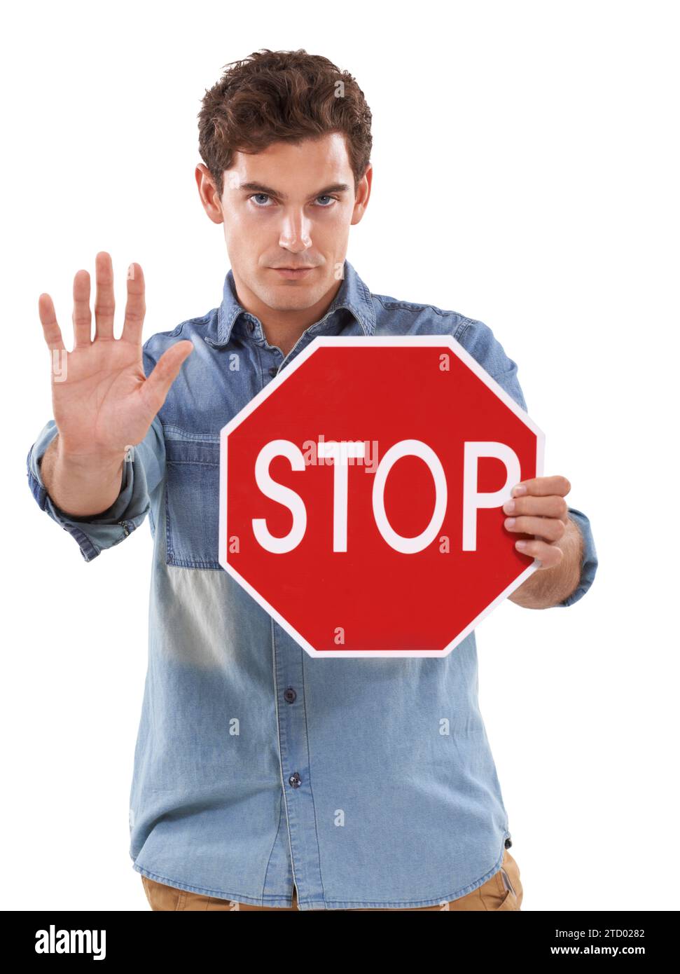 Portrait, man and traffic stop sign, palm and studio isolated on a ...