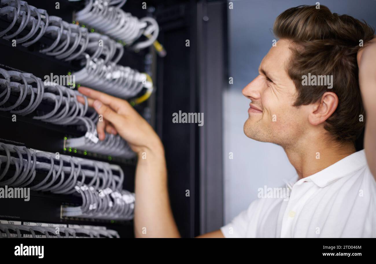 Server room, confused man and check cables with thinking for ...