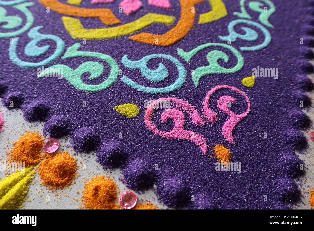Beautiful and colourful Rangoli backdrop. Designer pattern of sand art ...