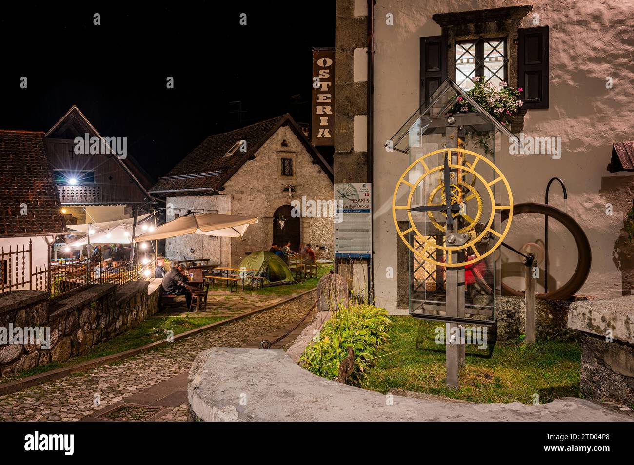 Last lights of day in the valley of time and clocks. Val Pesarina and ...