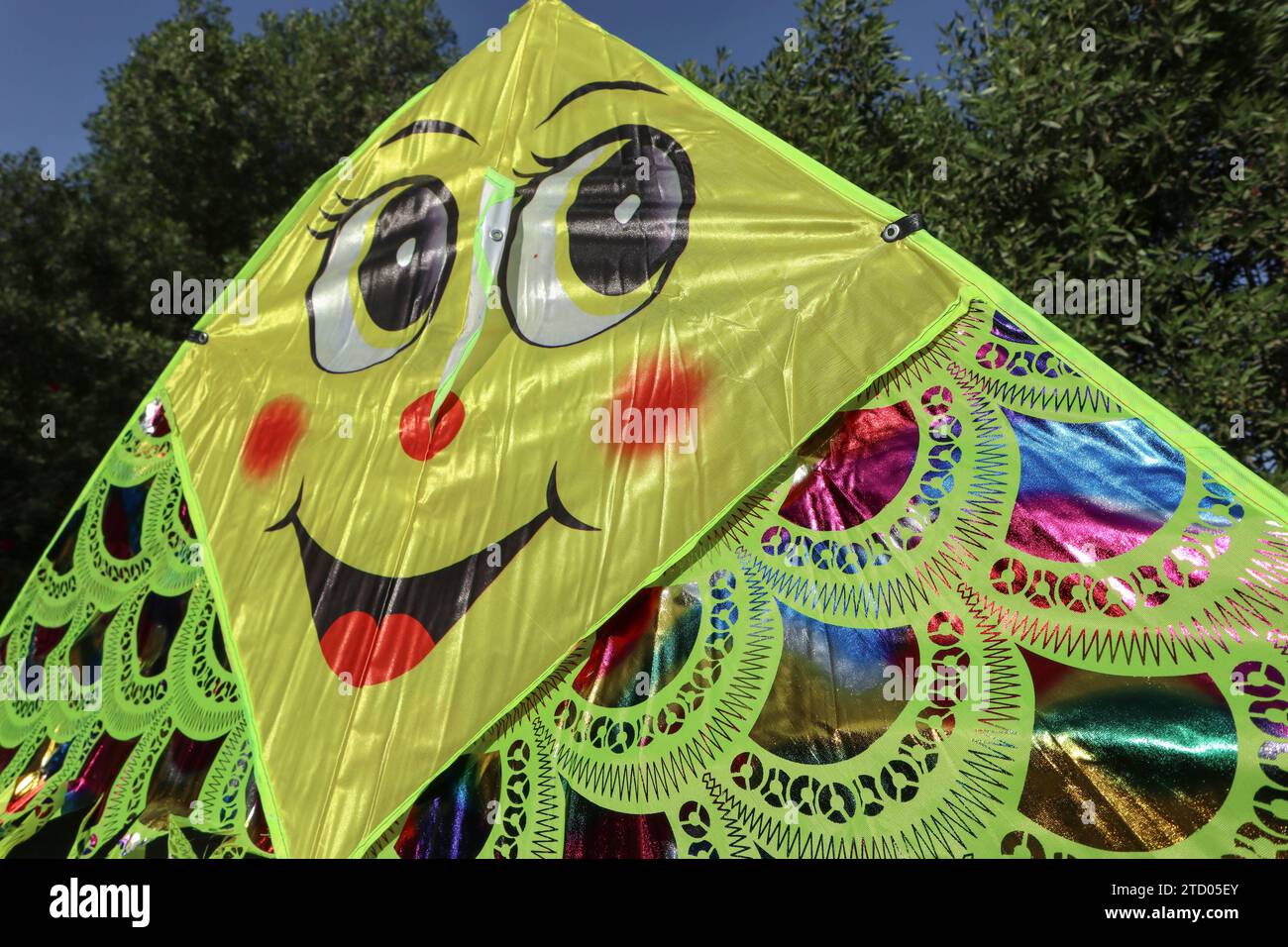 Flying big kite with smiley face. huge kite beautiful and cute Stock ...