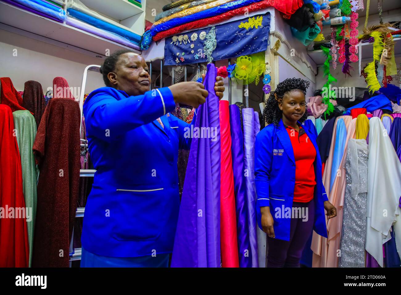 Traders are selling their fabric products at a textile shops in ...