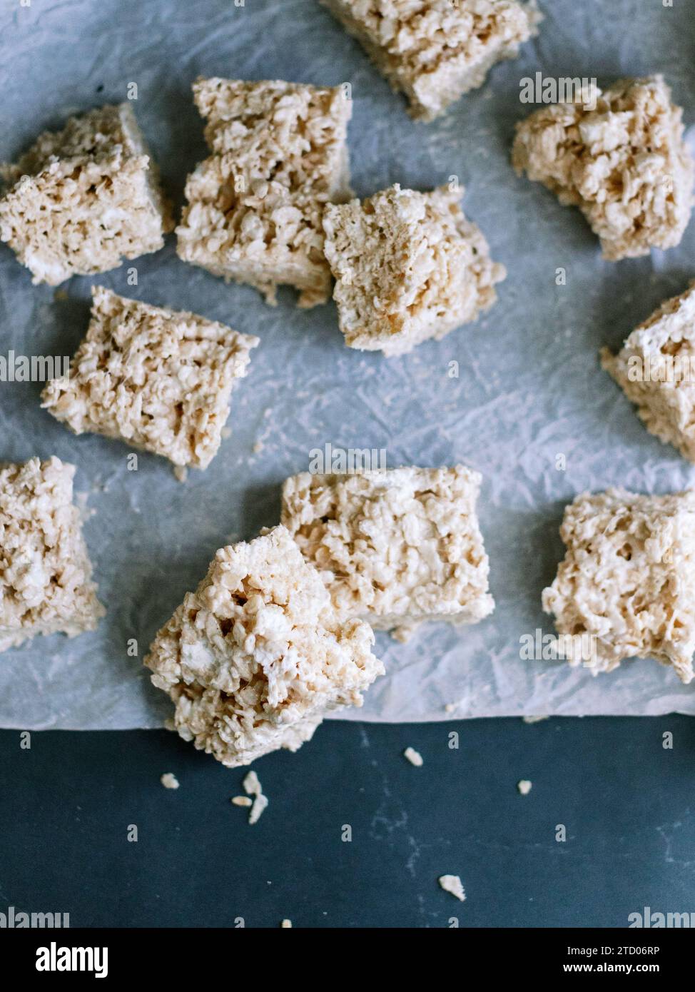 overhead rice krispie treat on parchment and blue background Stock ...