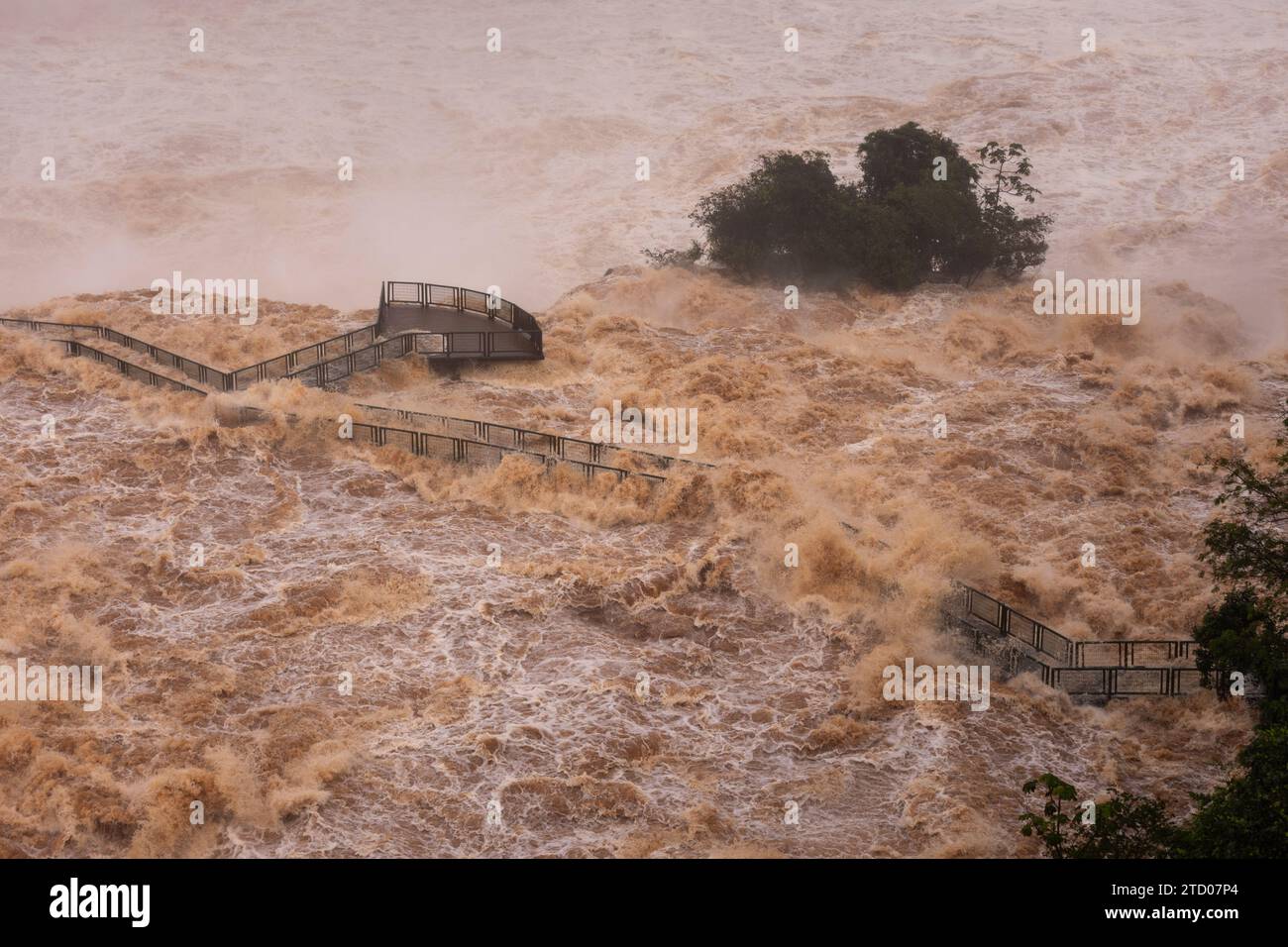 Strong water flowing over walking path way in second biggest flood ...
