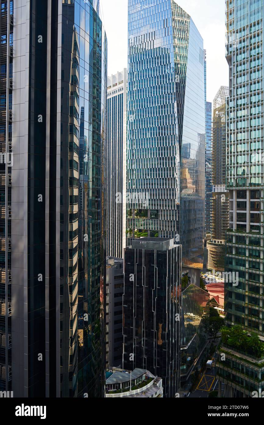 Reflections of close up glass facades of high rise office buildings ...