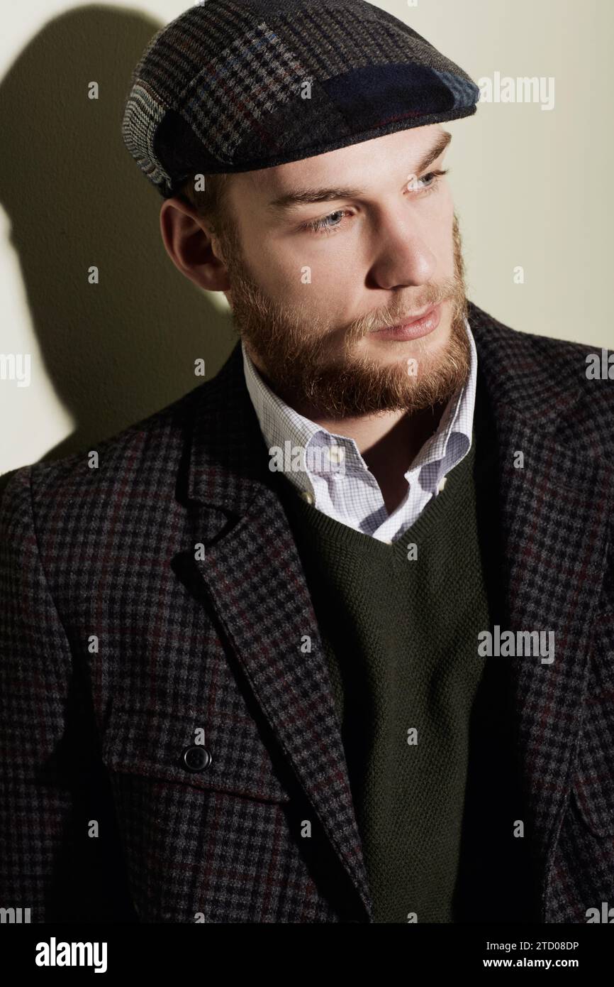 Fashion, thinking and young man in a studio with classy, elegant and ...