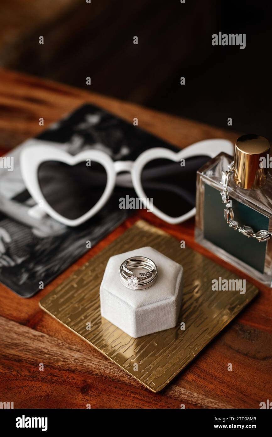 Stacked silver wedding rings on ring box with details Stock Photo - Alamy