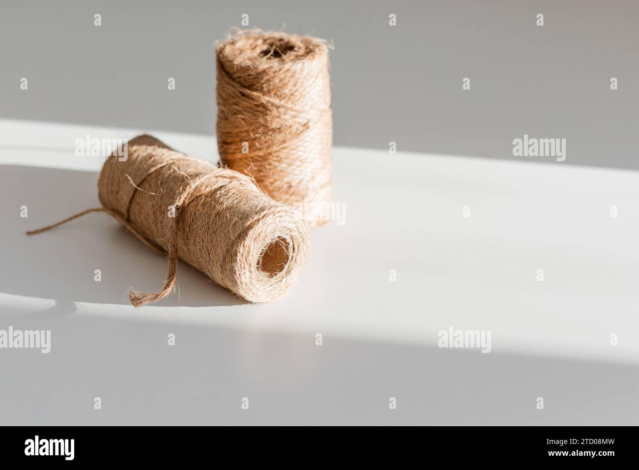 two trolls of twine hemp string Stock Photo - Alamy