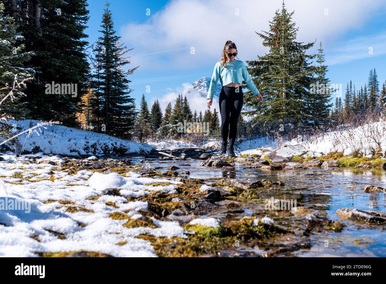 Pretty Girl Hikes Along Stream During Early Fall Hike Stock Photo - Alamy