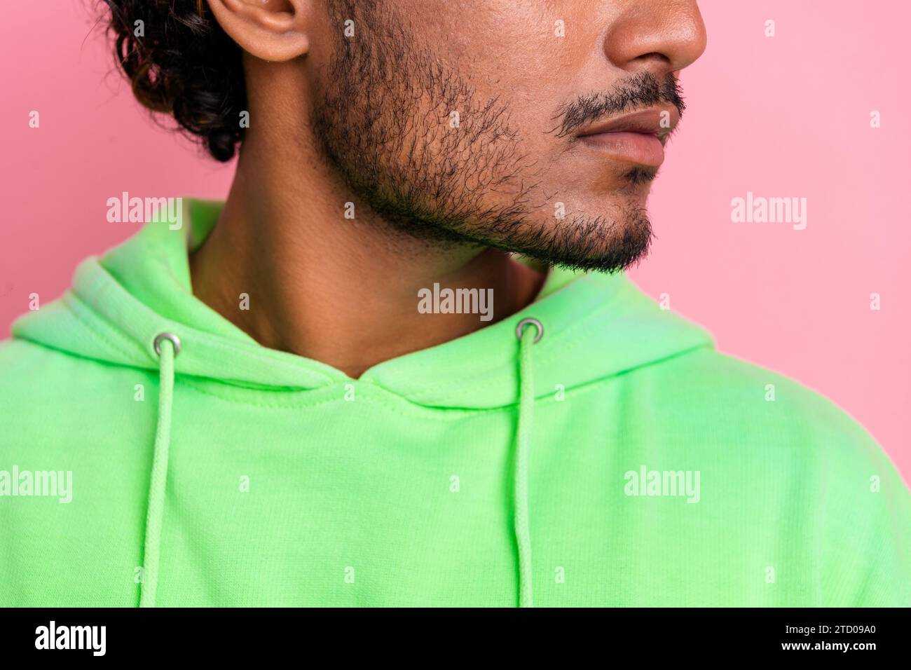 Close up cropped half face photo of hipster guy in green hoodie bristle ...