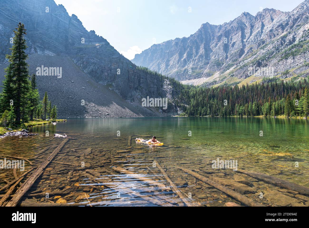 Cooling Off In Hidden Alpine Lake Near Lake Louise Stock Photo - Alamy