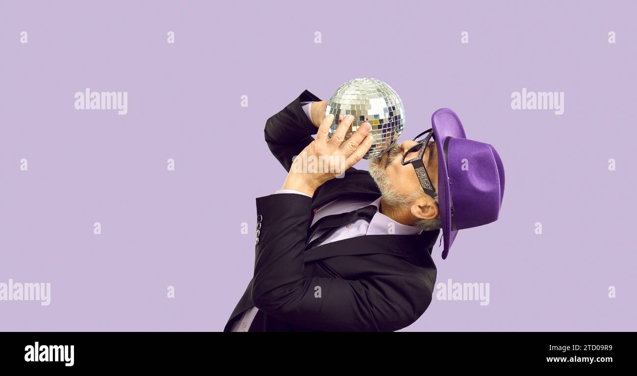 Funny old man with disco ball Stock Photo - Alamy